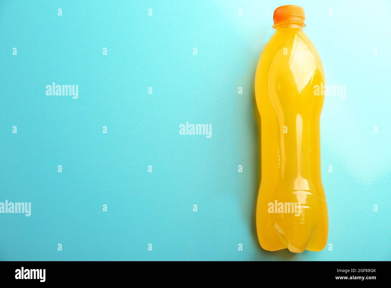 Bottle of soft drink on the blue background, top view Stock Photo - Alamy