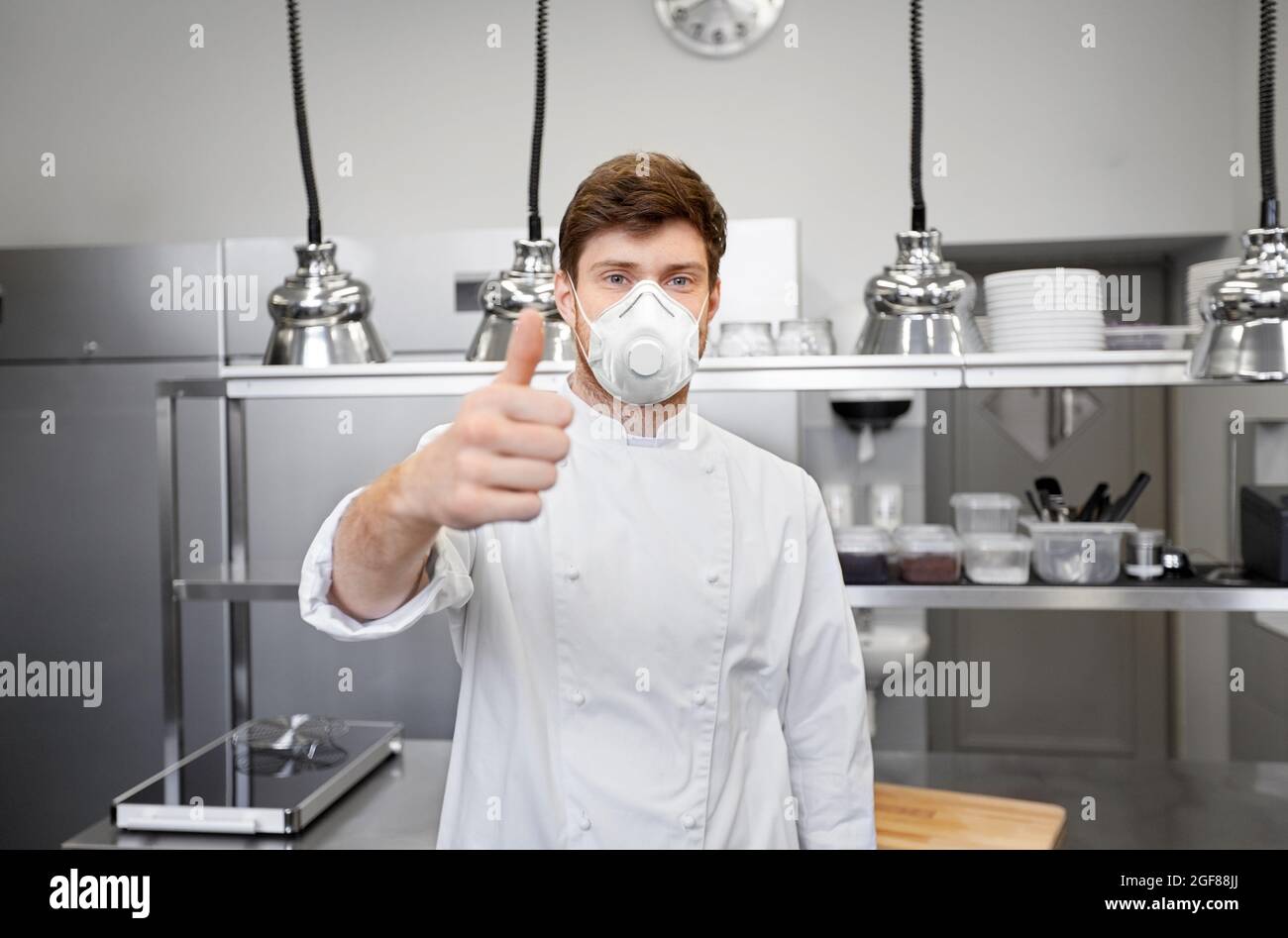 male chef with in respirator at restaurant kitchen Stock Photo - Alamy