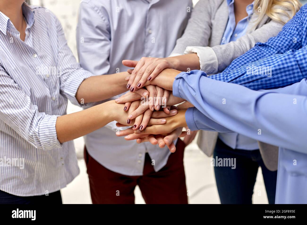 Stack hands collaboration group hi-res stock photography and images - Alamy