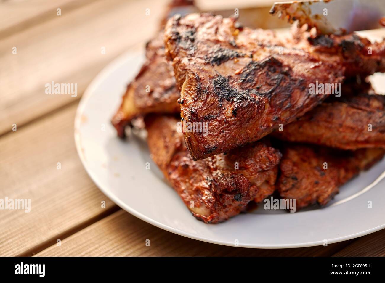 grilled barbecue meat stack on plate Stock Photo - Alamy