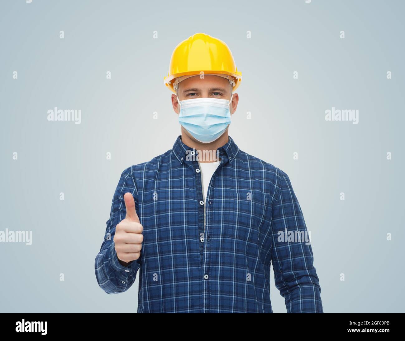 Male builder wearing mask hi-res stock photography and images - Alamy
