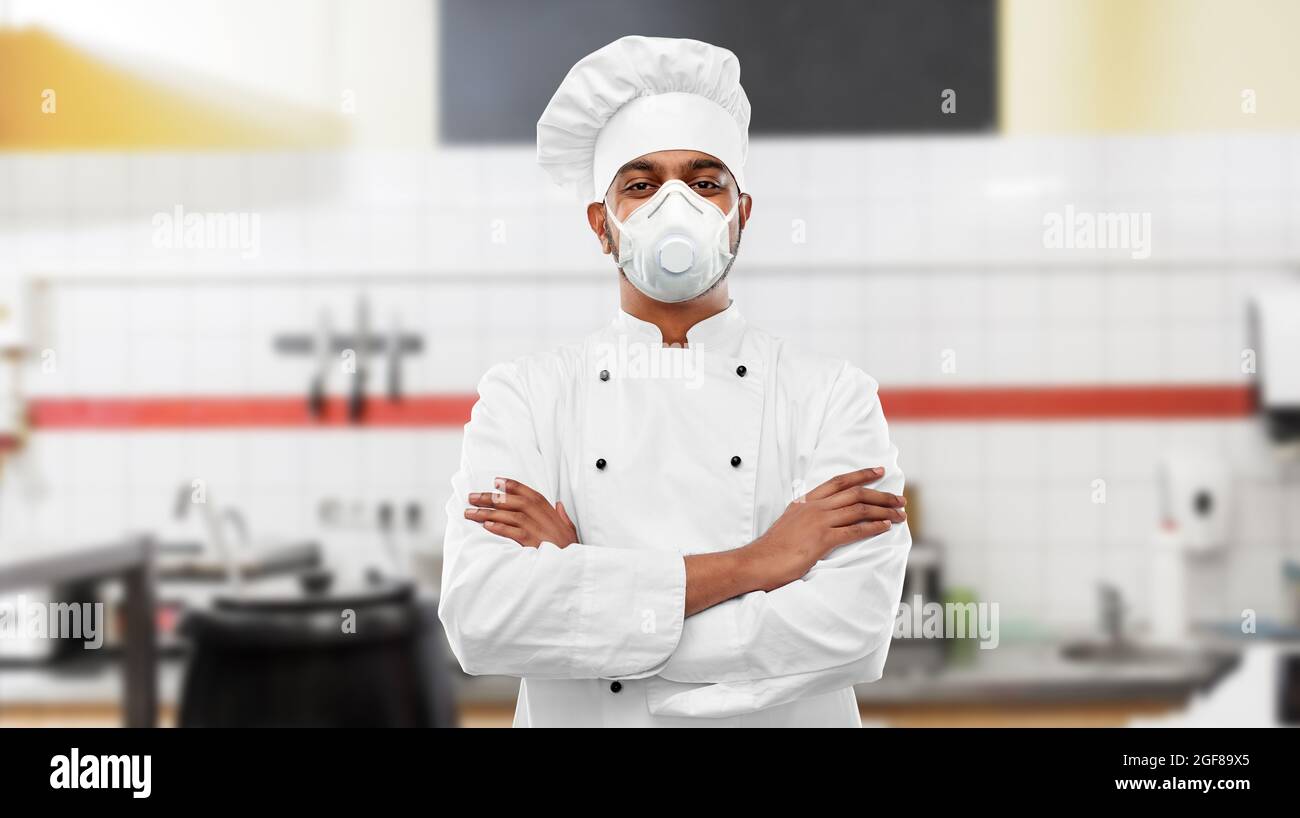 male chef in respirator at restaurant kitchen Stock Photo - Alamy