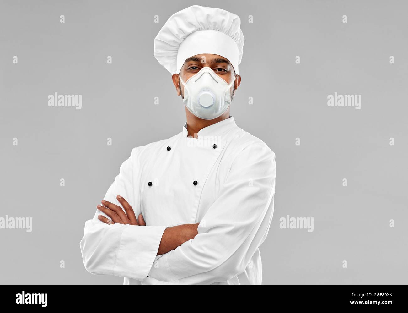 male chef in respirator at restaurant kitchen Stock Photo - Alamy