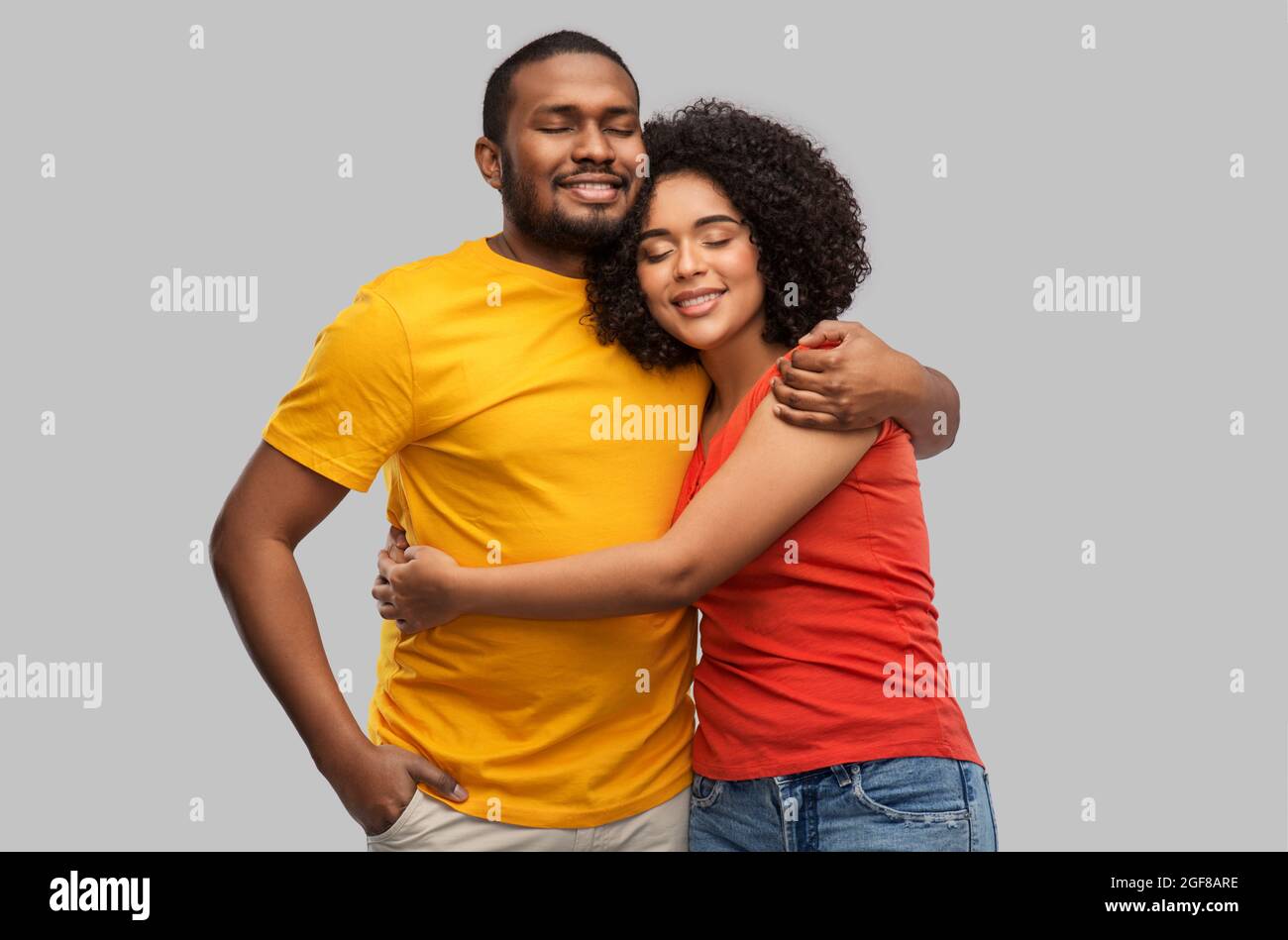 happy african american couple hugging Stock Photo - Alamy