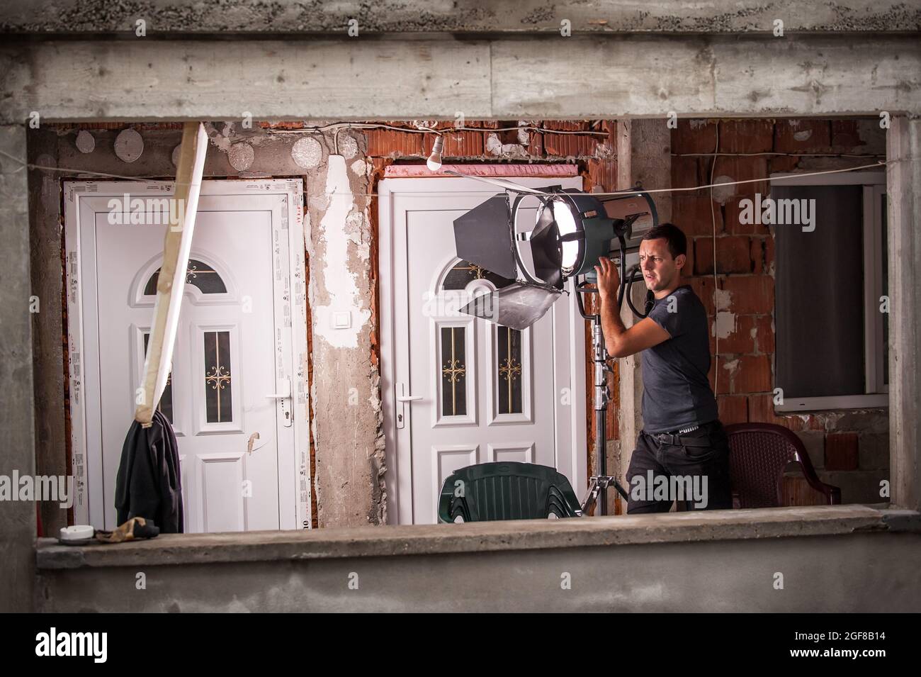 Behind the scene. Filmmaking lighting technician electric engineer ...