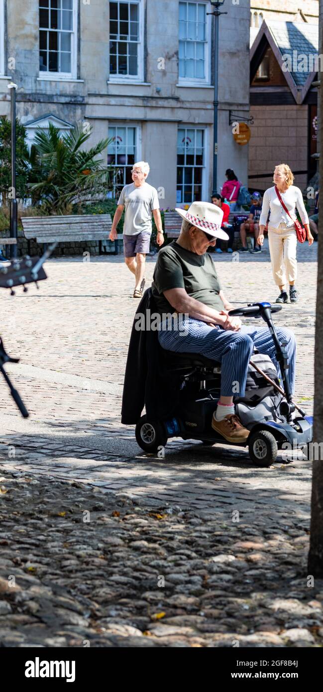 Truro, UK. 24th Aug, 2021. People make the most of the glorious sunshine in Truro, Cornwall. A ...