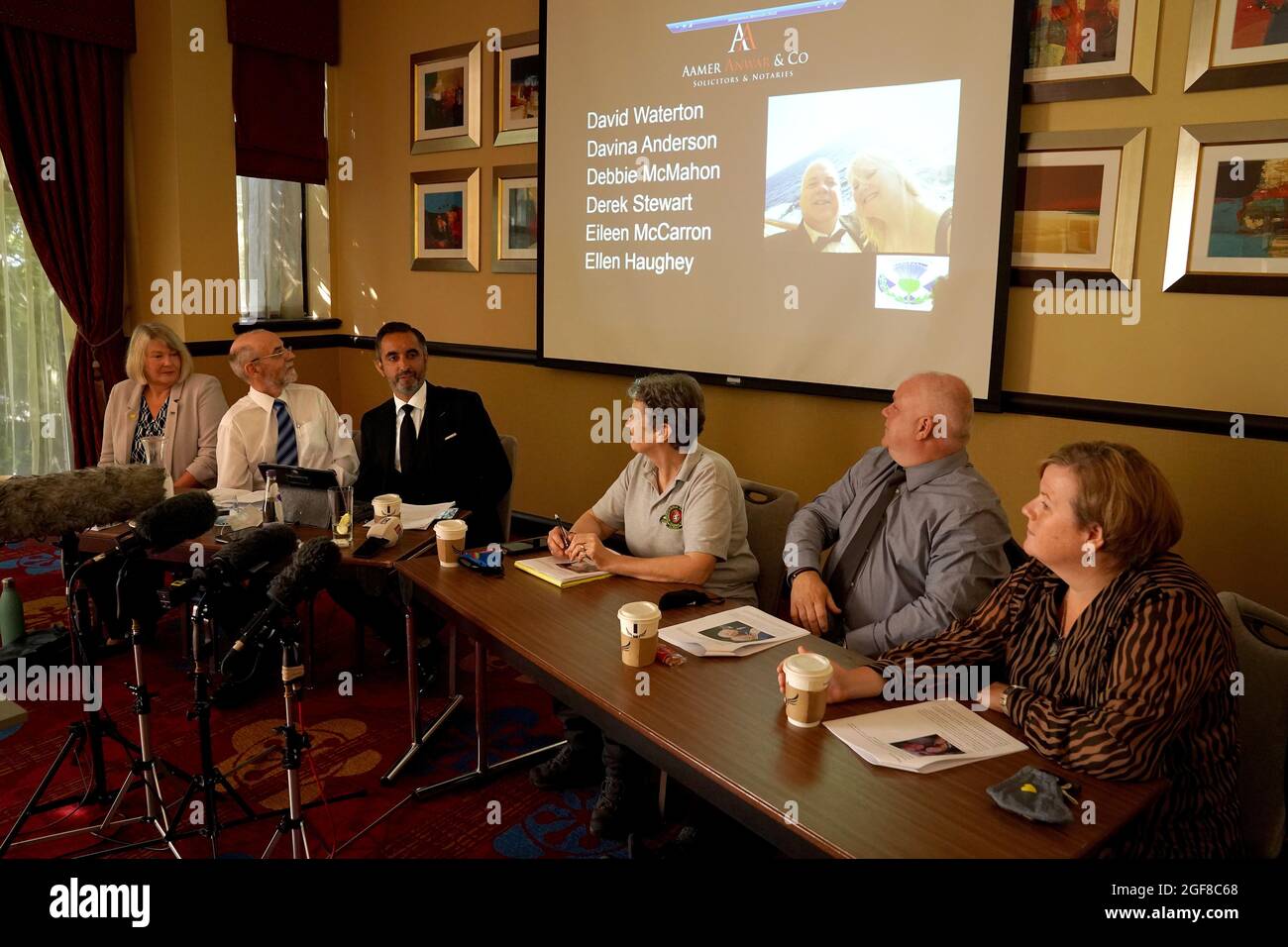 Solicitor Aamer Anwar (third left) and members of the Scottish branch ...