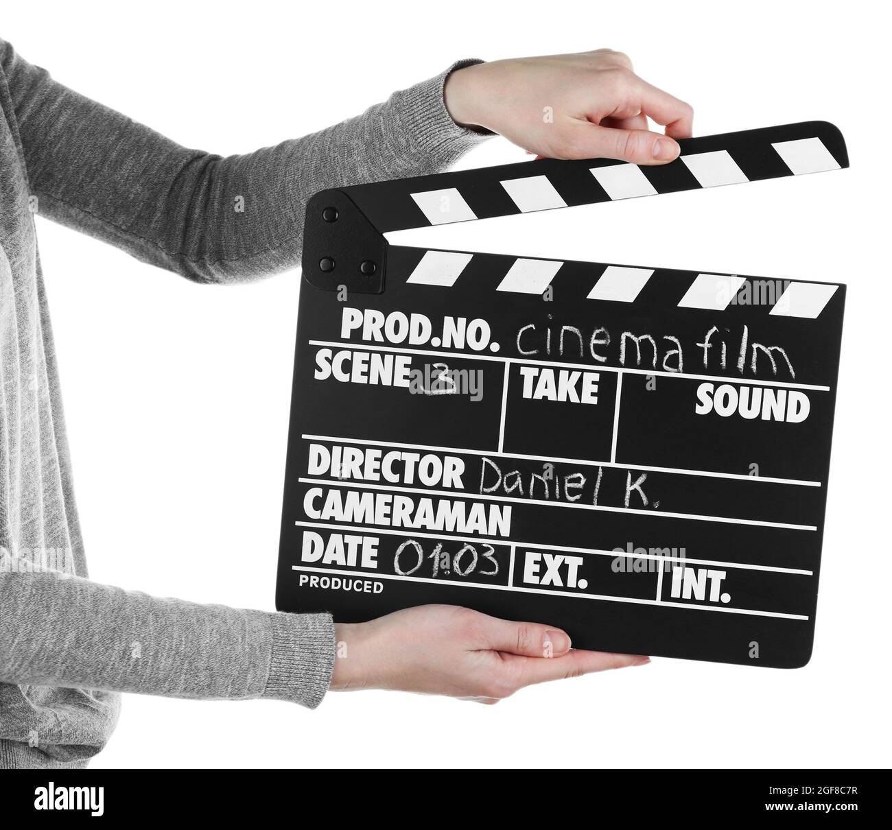 Female hands holding movie clapper isolated on white Stock Photo - Alamy