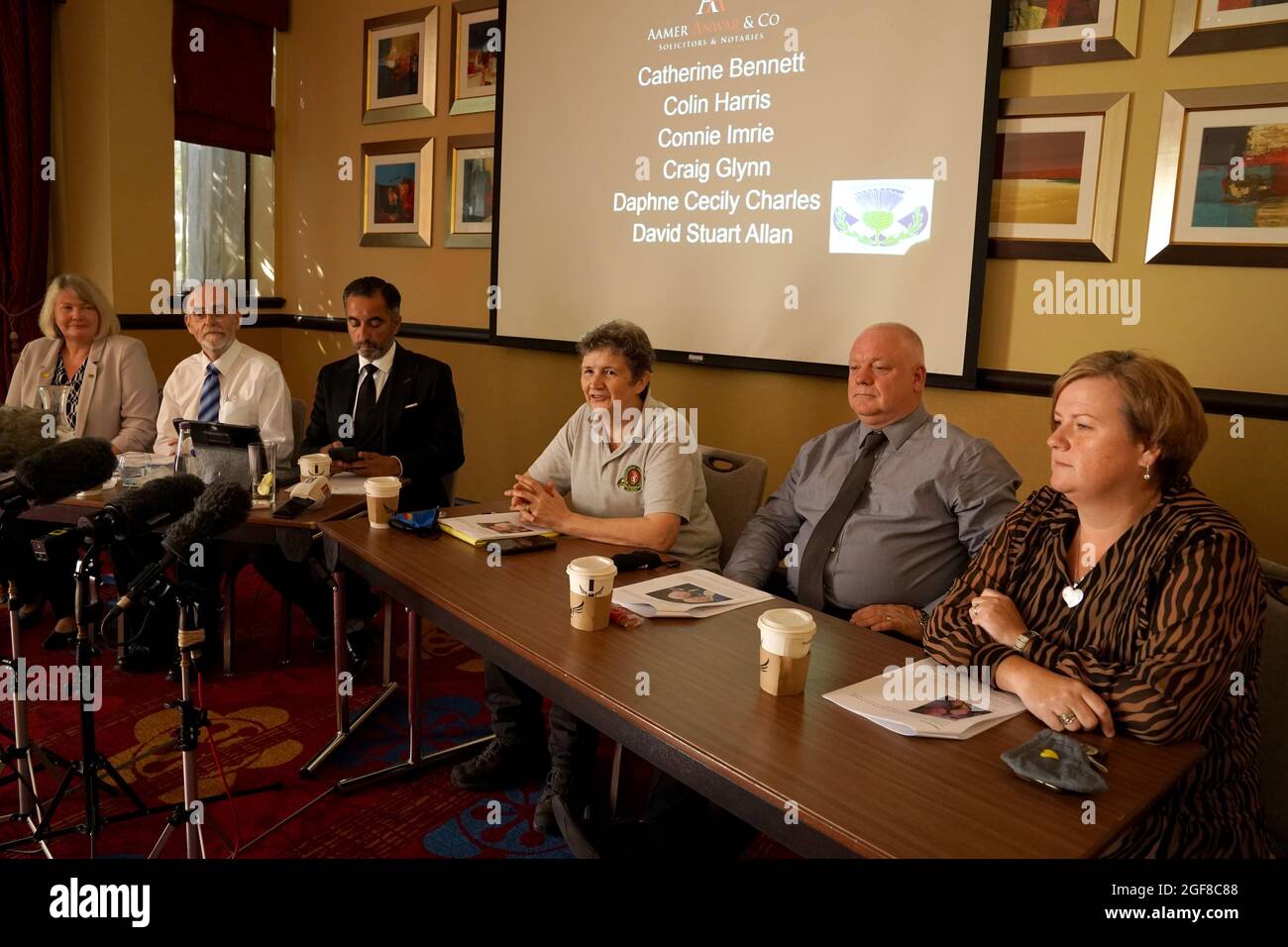 Solicitor Aamer Anwar (third left) and members of the Scottish branch ...