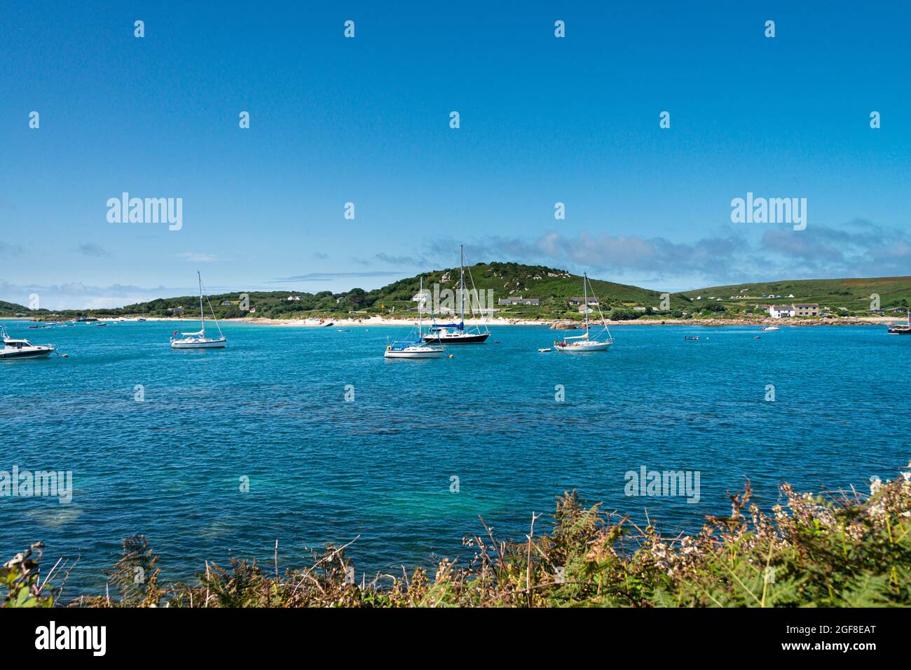 Boats at anchor between the islands of Tresco and Bryher, Isles of ...