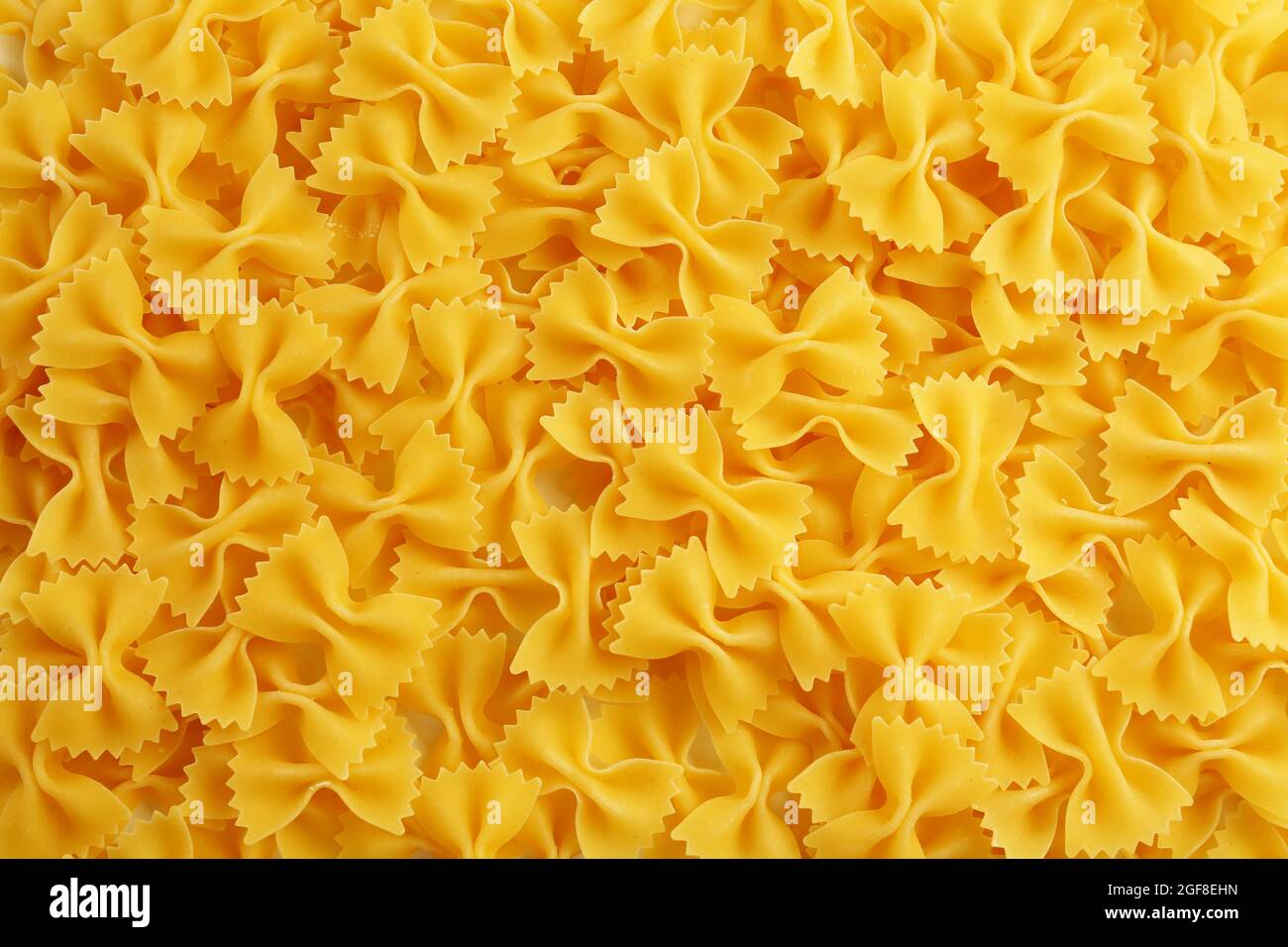 Italian dry pasta background, top view Stock Photo - Alamy