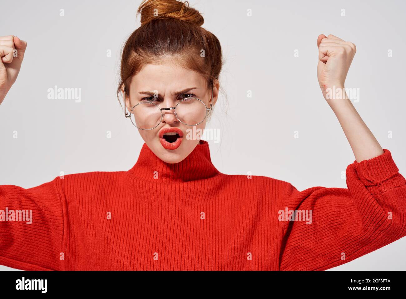 portrait of a woman with glasses posing Studio fun model Stock Photo ...