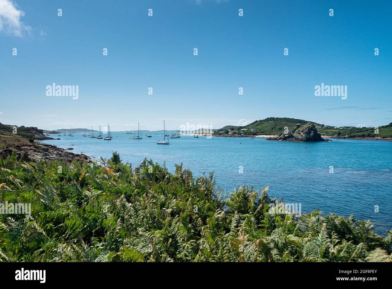 Boats at anchor between the islands of Tresco and Bryher, Isles of ...