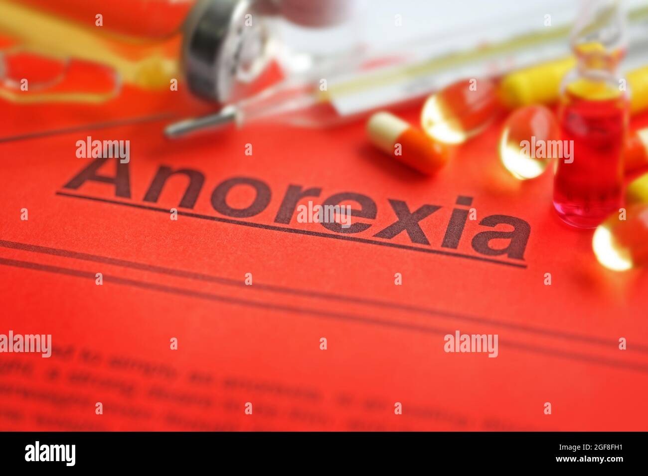 Medicines and Anorexia diagnosis written on paper closeup Stock Photo ...