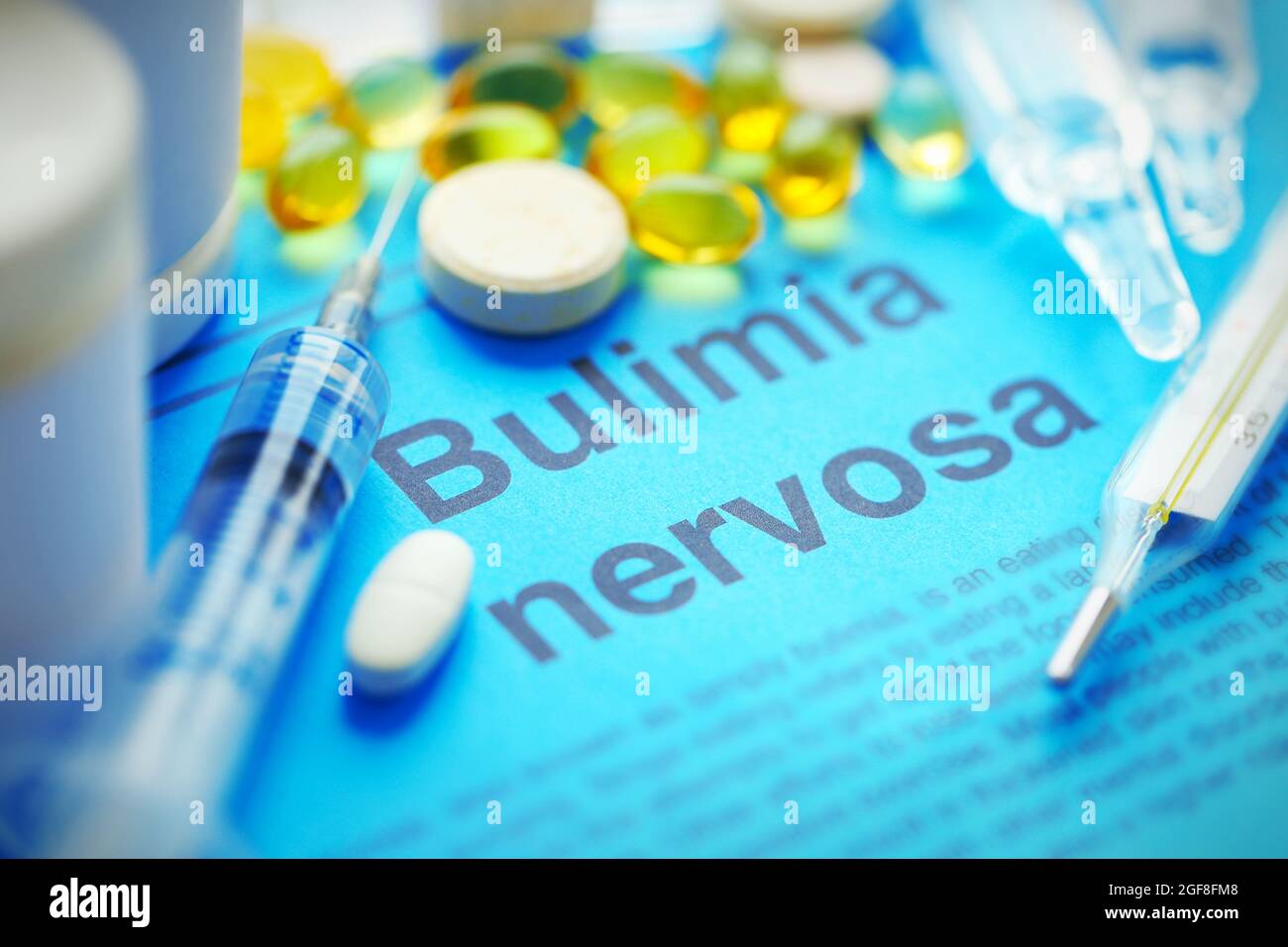 Medicines and Bulimia diagnosis written on paper closeup Stock Photo ...