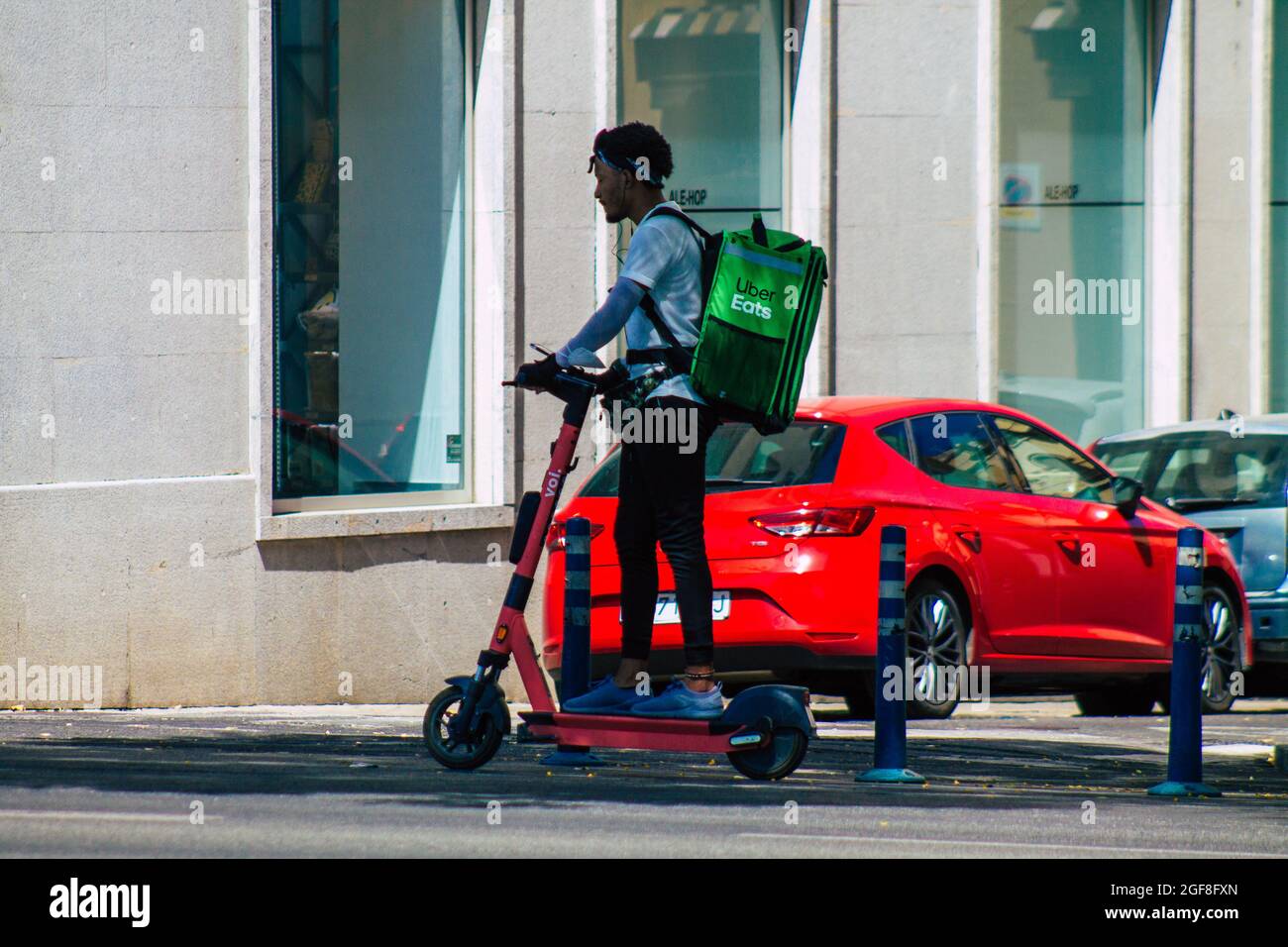 Seville Spain August 21, 2021 People rolling with an electric scooter ...