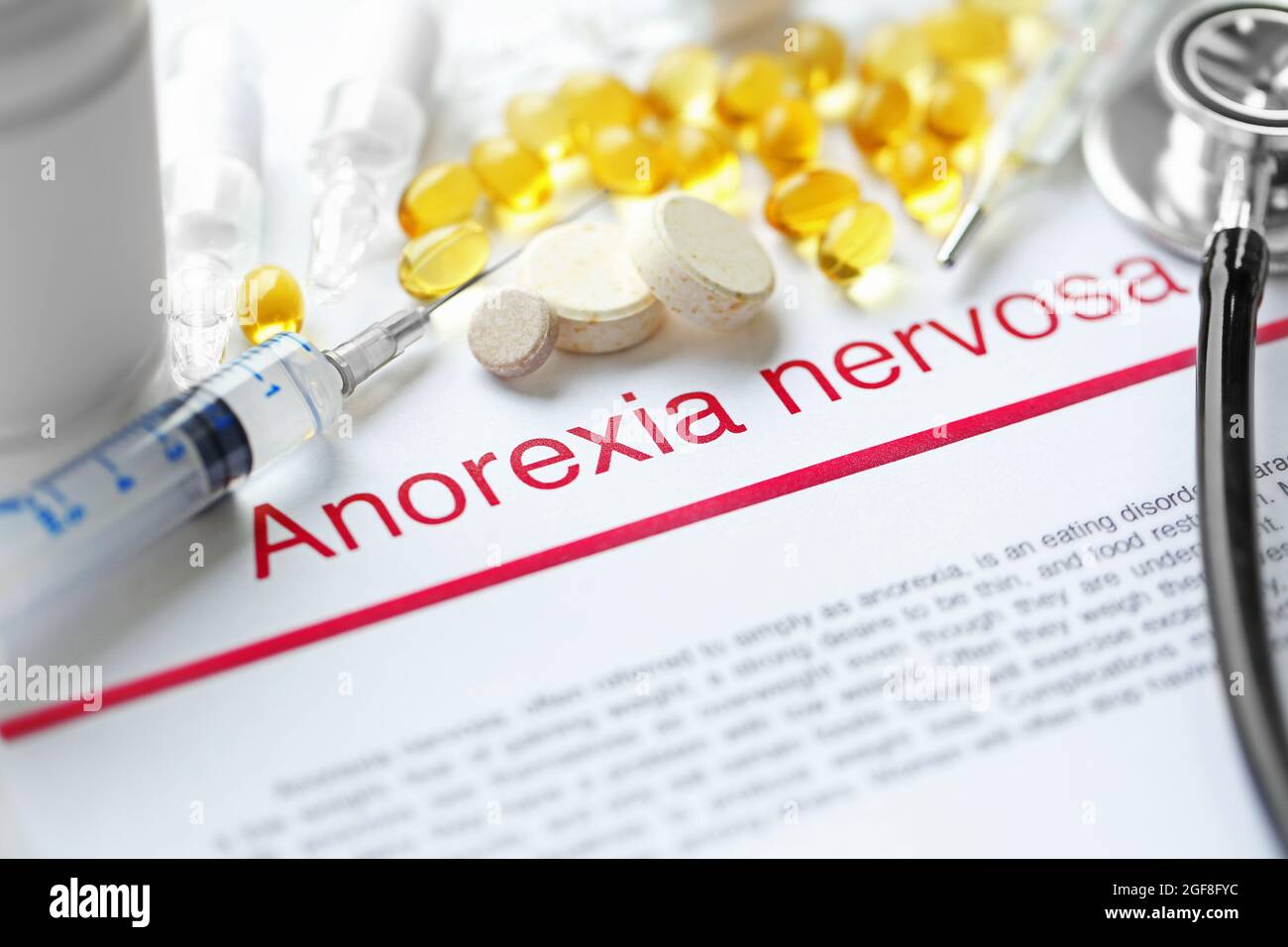 Medicines and Anorexia diagnosis written on paper closeup Stock Photo ...