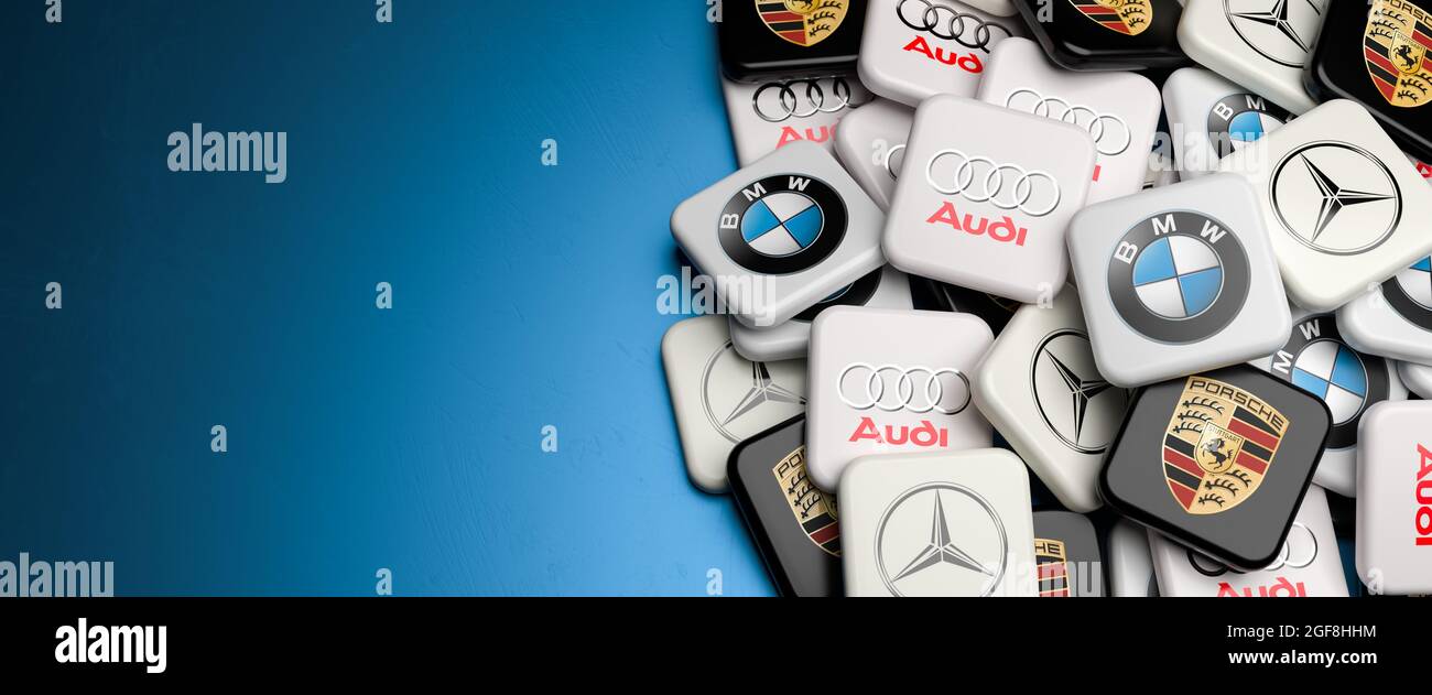 Logos of the German luxury car manufacturers Daimler (Mercedes Benz ...