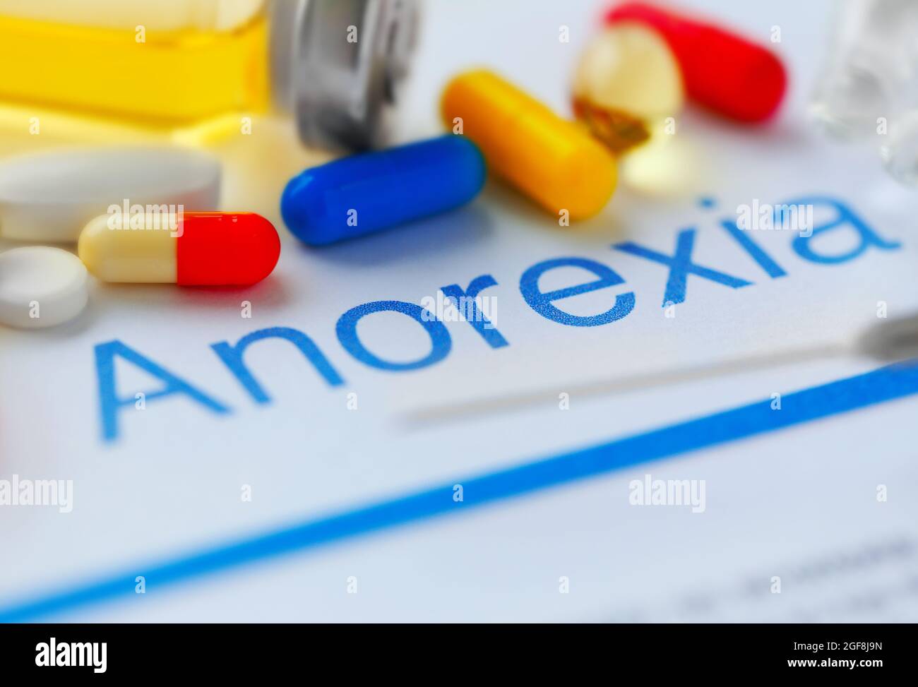 Medicines and Anorexia diagnosis written on paper closeup Stock Photo ...