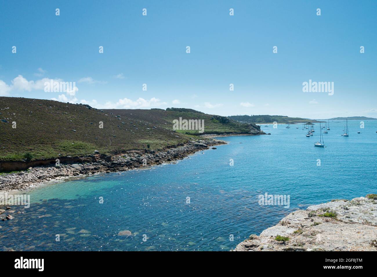 Boats at anchor off the coast of Tresco, Isles of Scilly Stock Photo ...