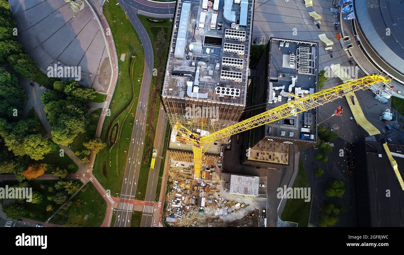 Business skyscraper under construction, aerial view. Construction of a ...