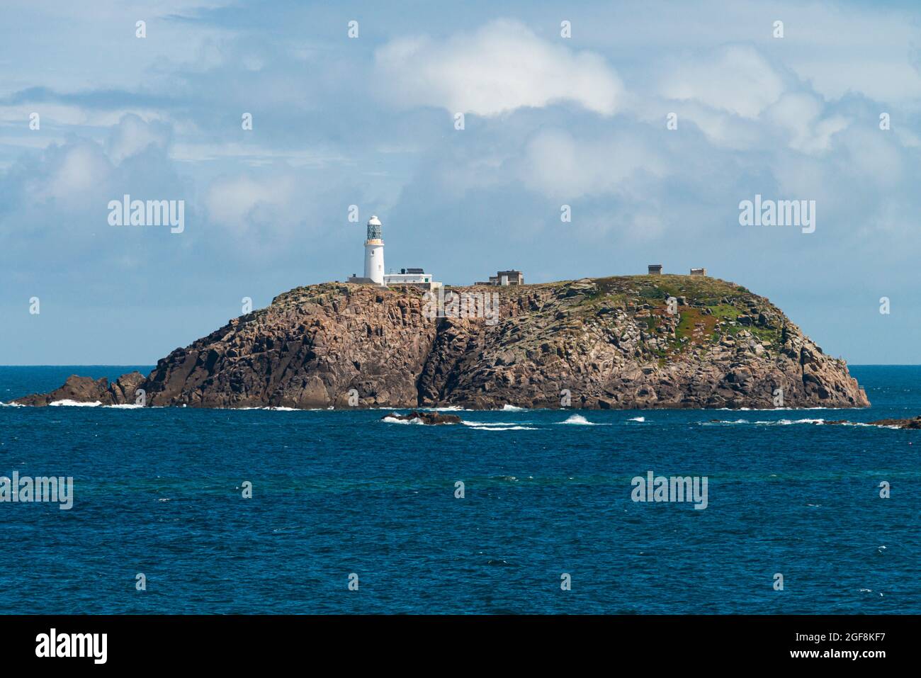 Round Island Lighthouse seen from Tresco, Isles of Scilly Stock Photo ...