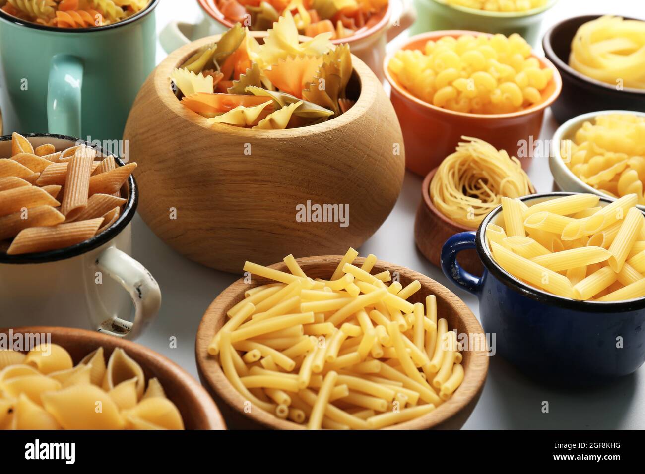 Various types of pasta in dishes, top view Stock Photo - Alamy