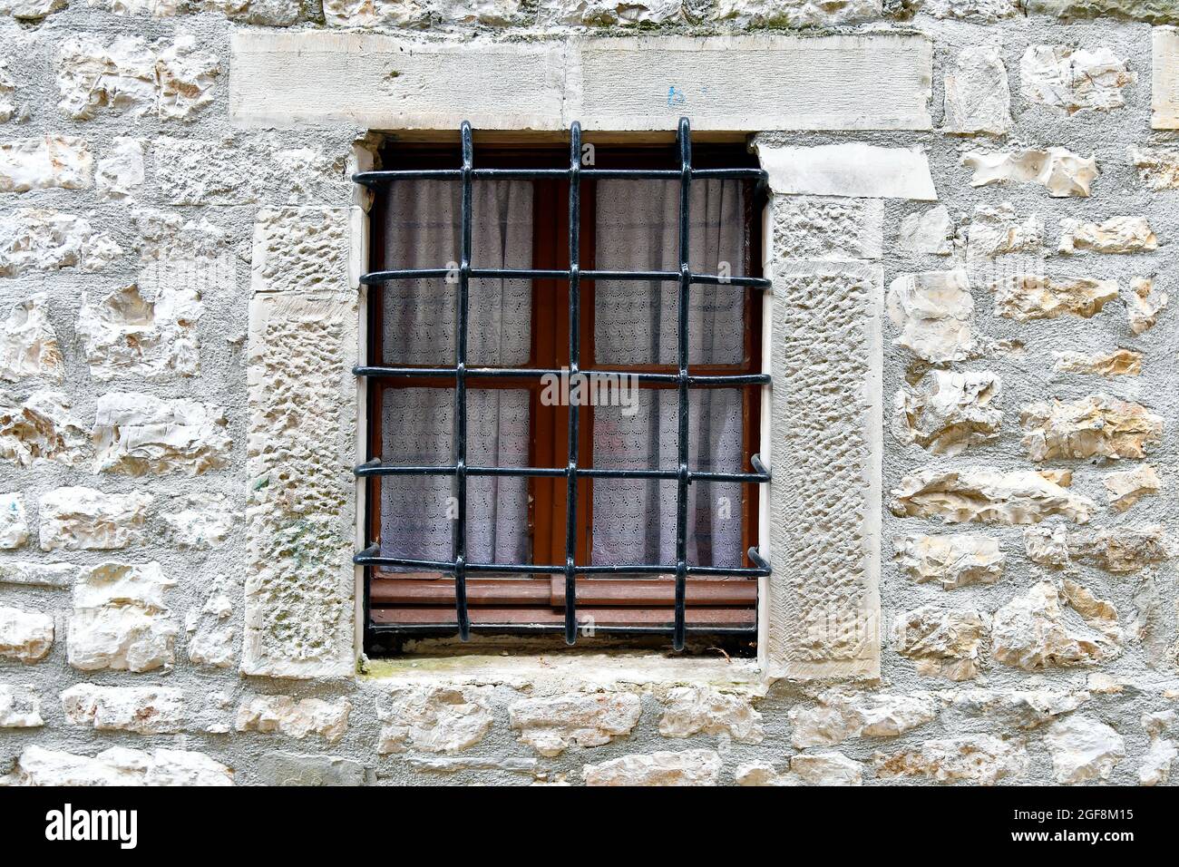 Greece, Ioannina, with iron barred window Stock Photo - Alamy