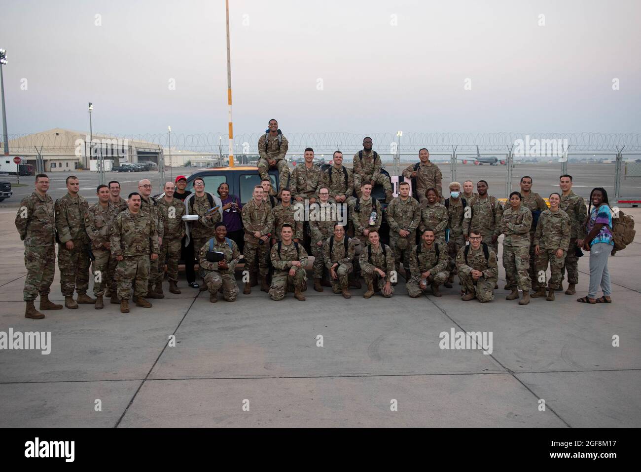 Airmen assigned to the 728th Air Mobility Squadron pose for a photo at ...