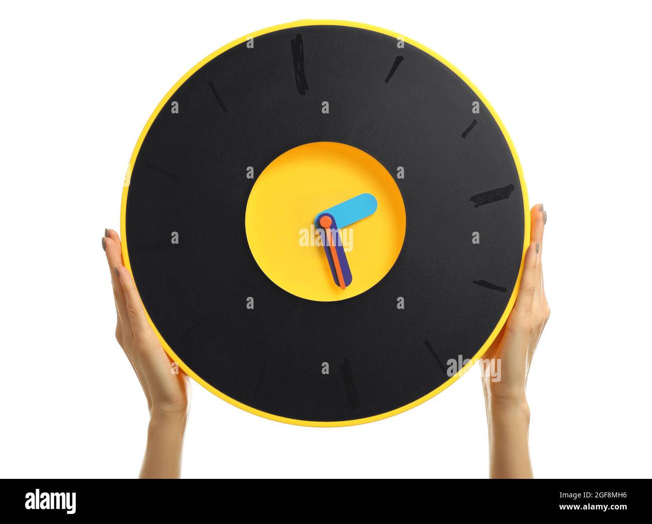 Woman's hands holding a clock, isolated on white Stock Photo - Alamy