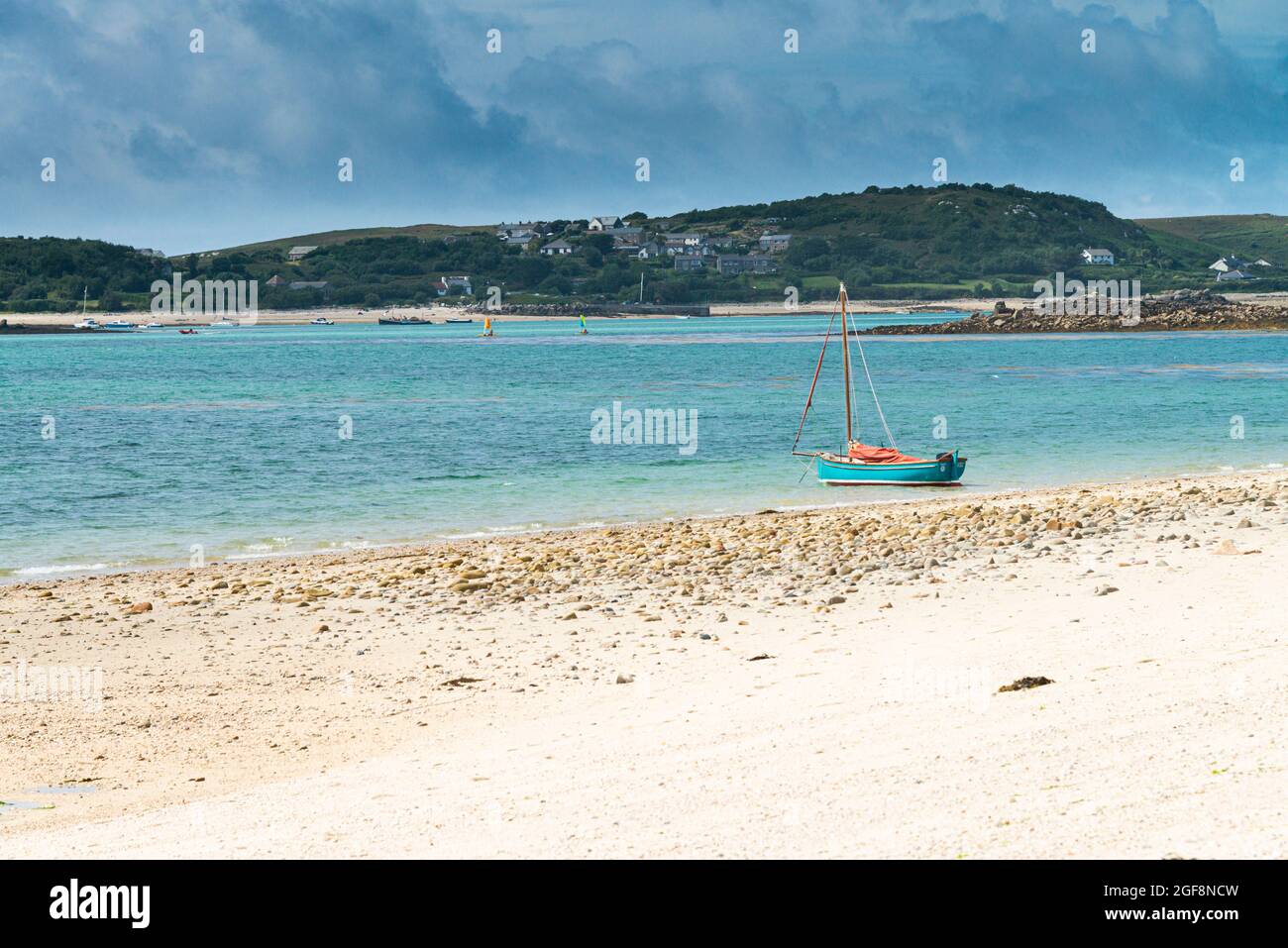 A sailing boat at Appletree Bay, Tresco, Isles of Scilly Stock Photo ...
