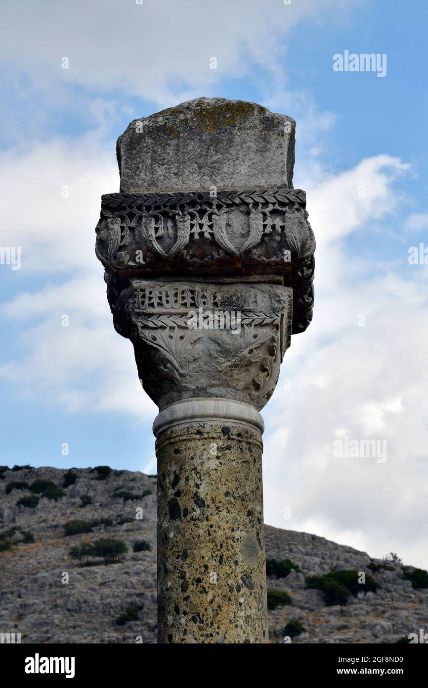 Greece, column with relief in Unesco world heritage site of ancient ...