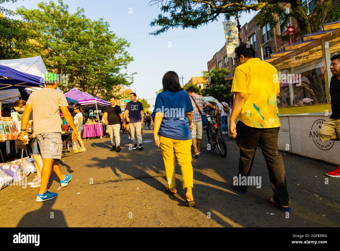 QUEENS, UNITED STATES - Jul 26, 2021: The people walking at the Astoria ...