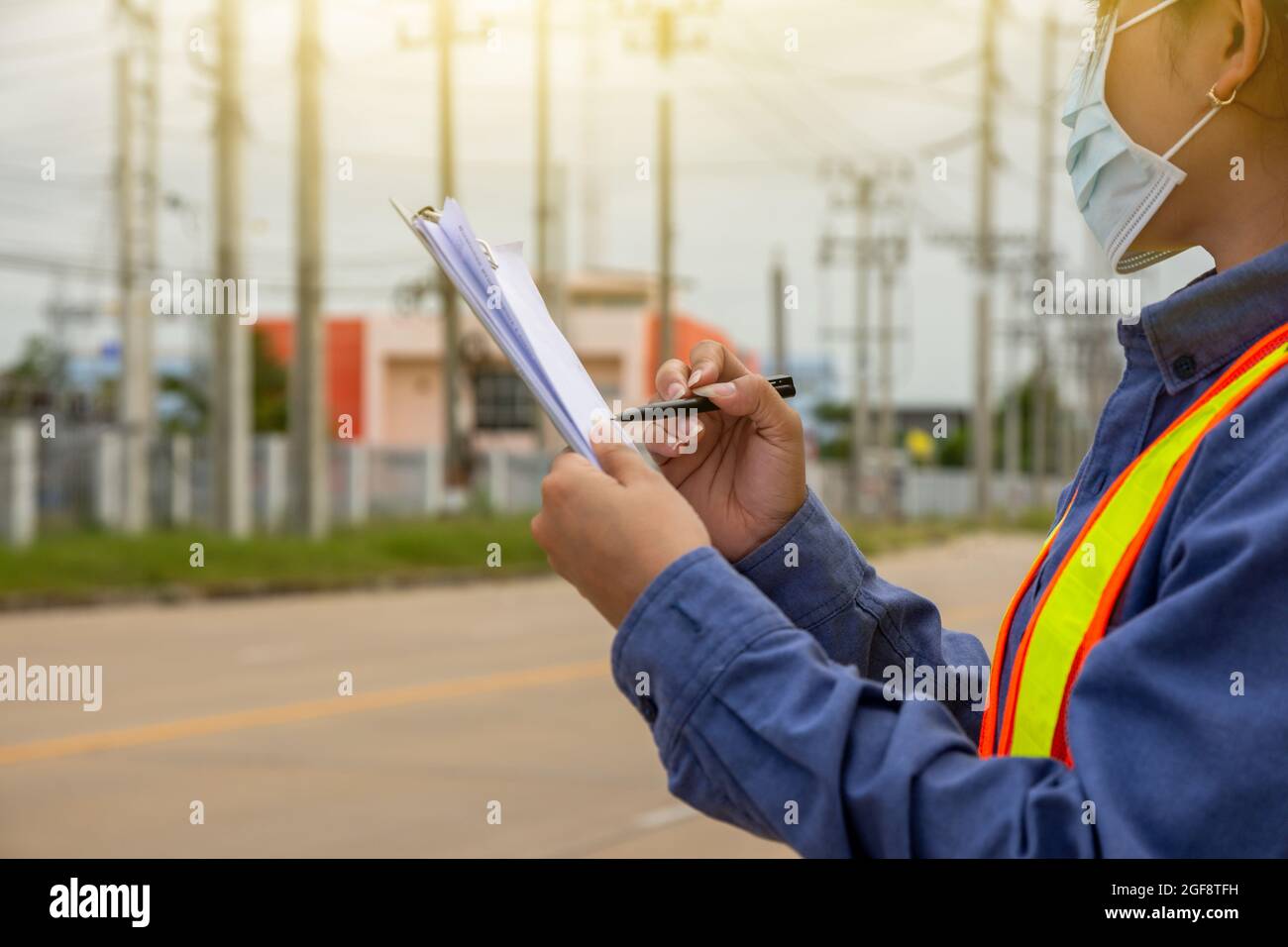 Women Engineer Working on site service check Electricity system Stock ...