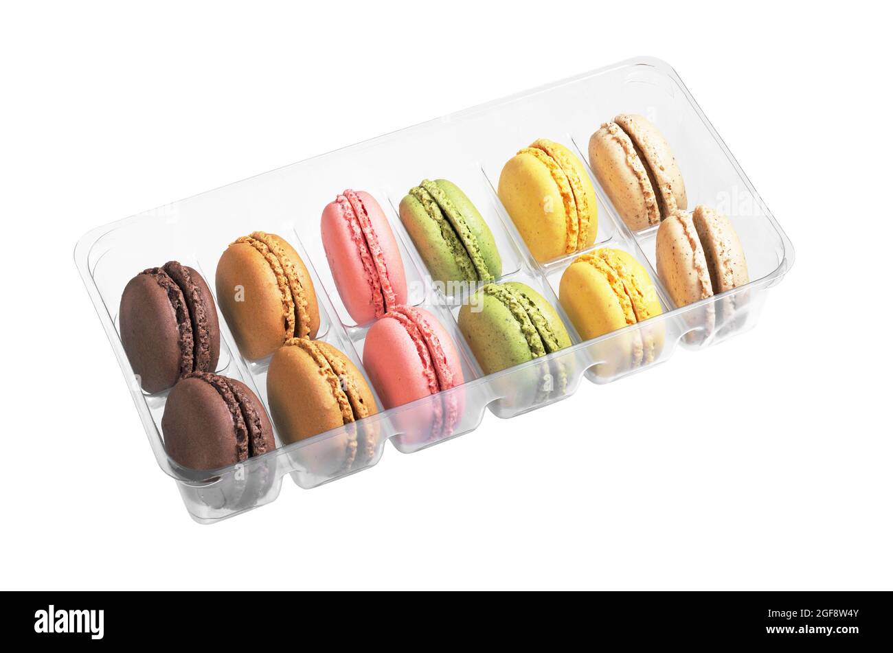 Colorful mini macaroons in a plastic box isolated on white background ...