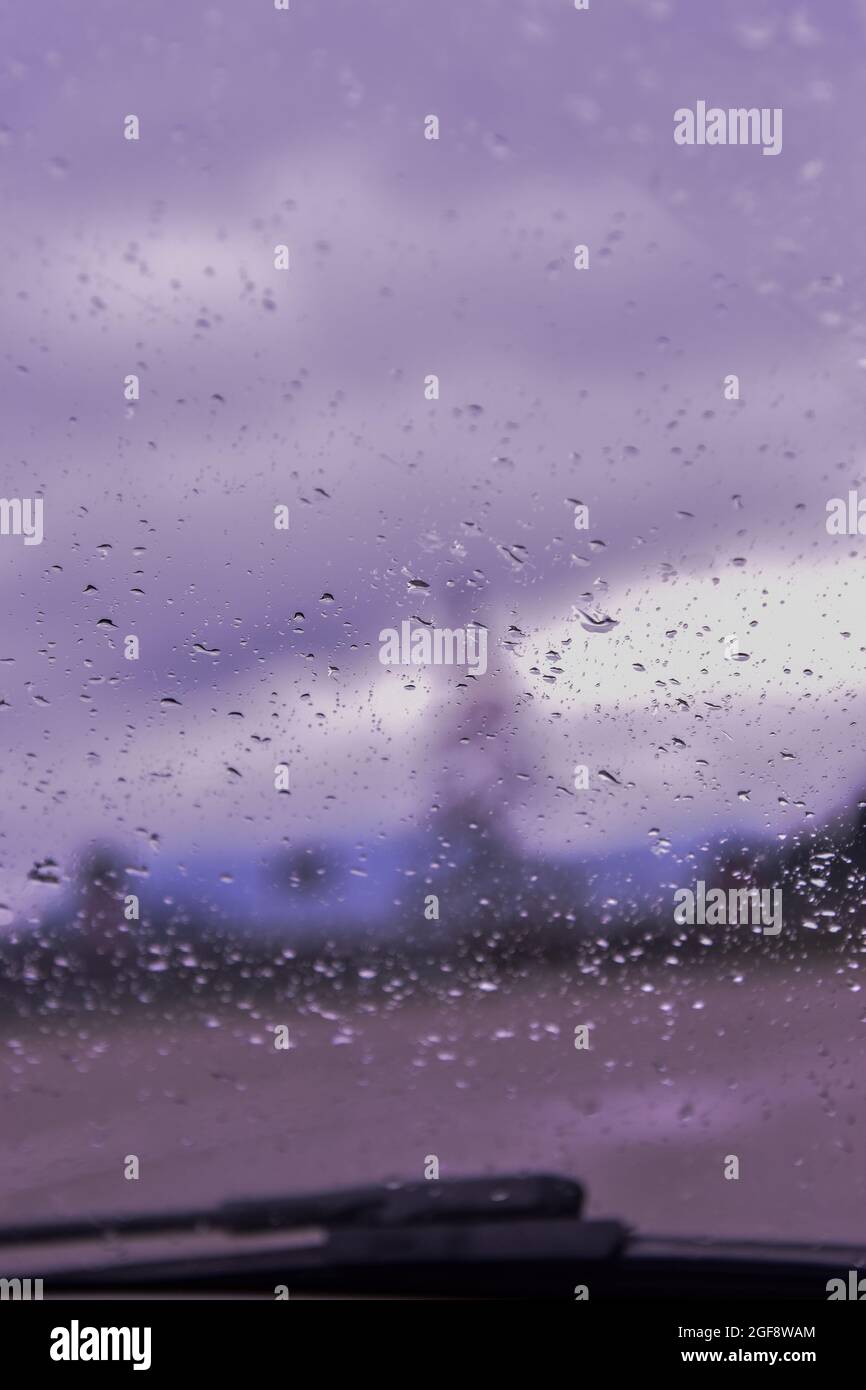 Moody view of mountain landscape through a wet window after rain Stock ...