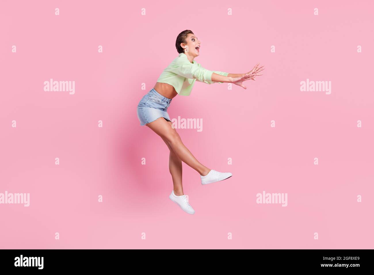 Full length profile side photo of young girl amazed shocked jump fly ...