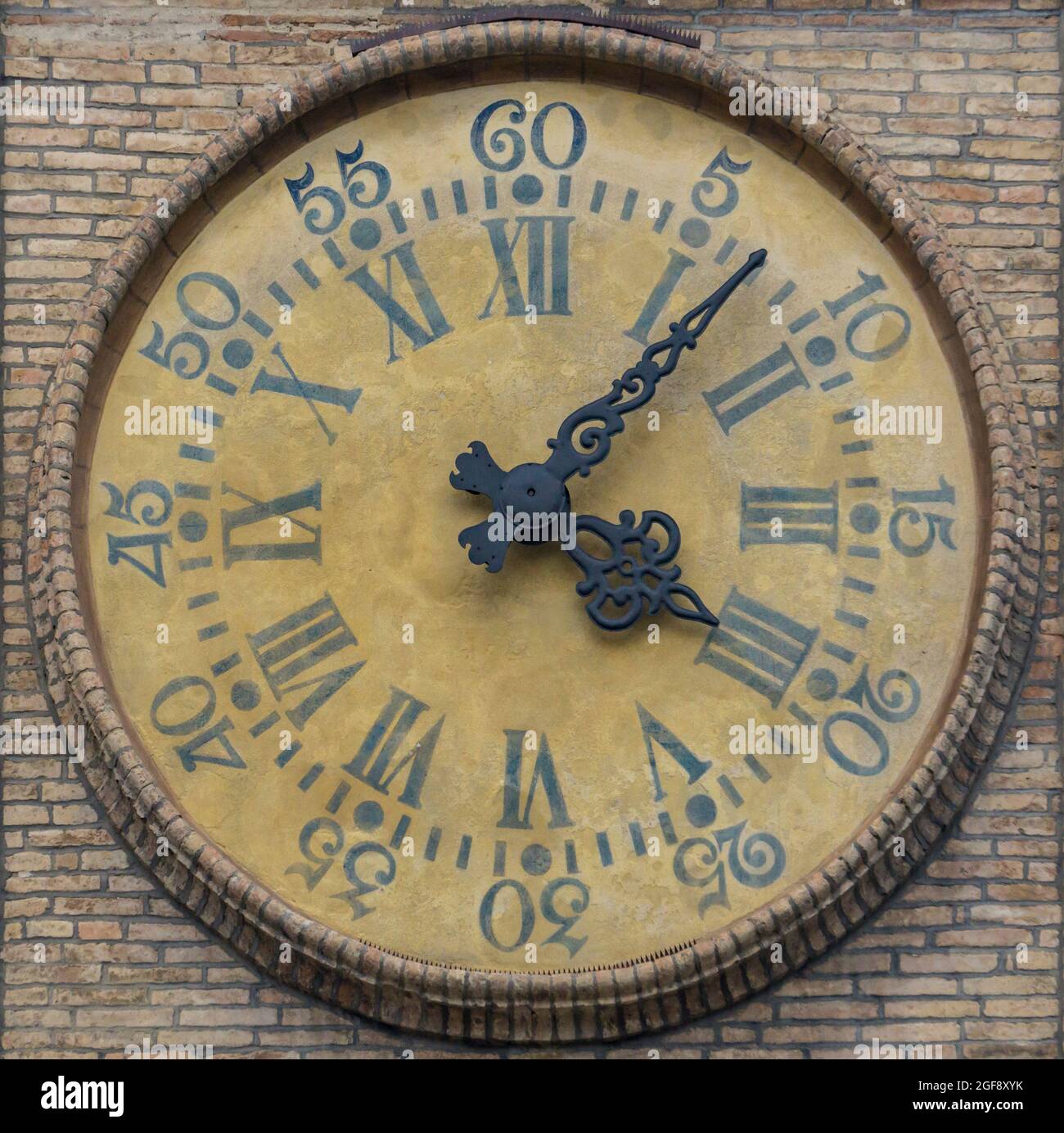 View at ancient watch on the wall in PArma, Italy Stock Photo - Alamy