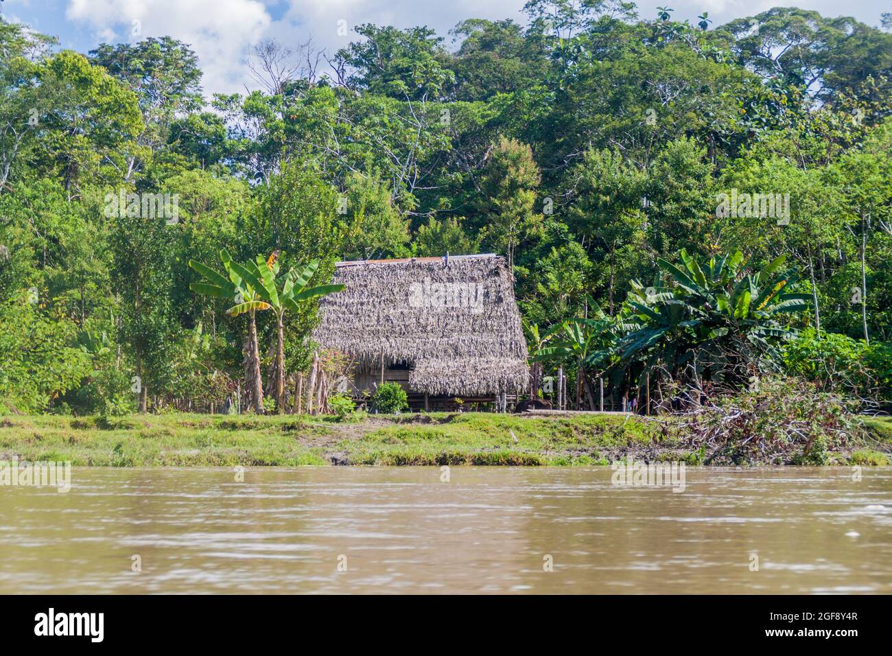 Small house in a peruvian jungle Stock Photo - Alamy