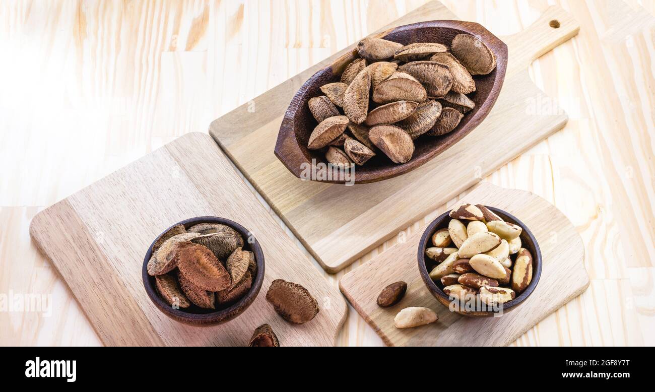 Brazilian chestnuts, called Brazil nuts, in a rustic wood setting Stock ...