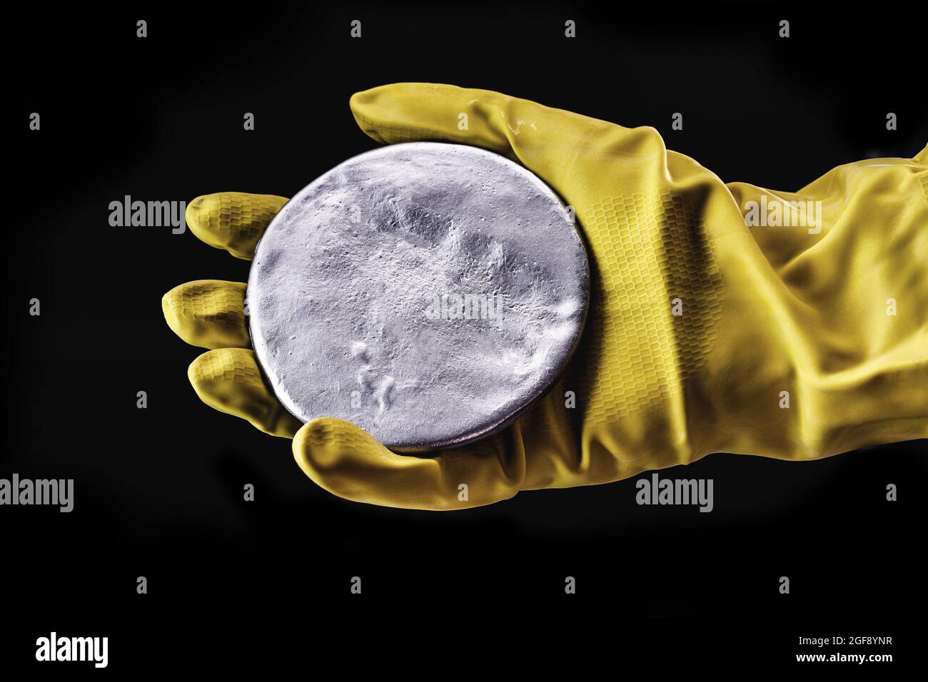 A highly enriched uranium billet. Highly radioactive material used in ...