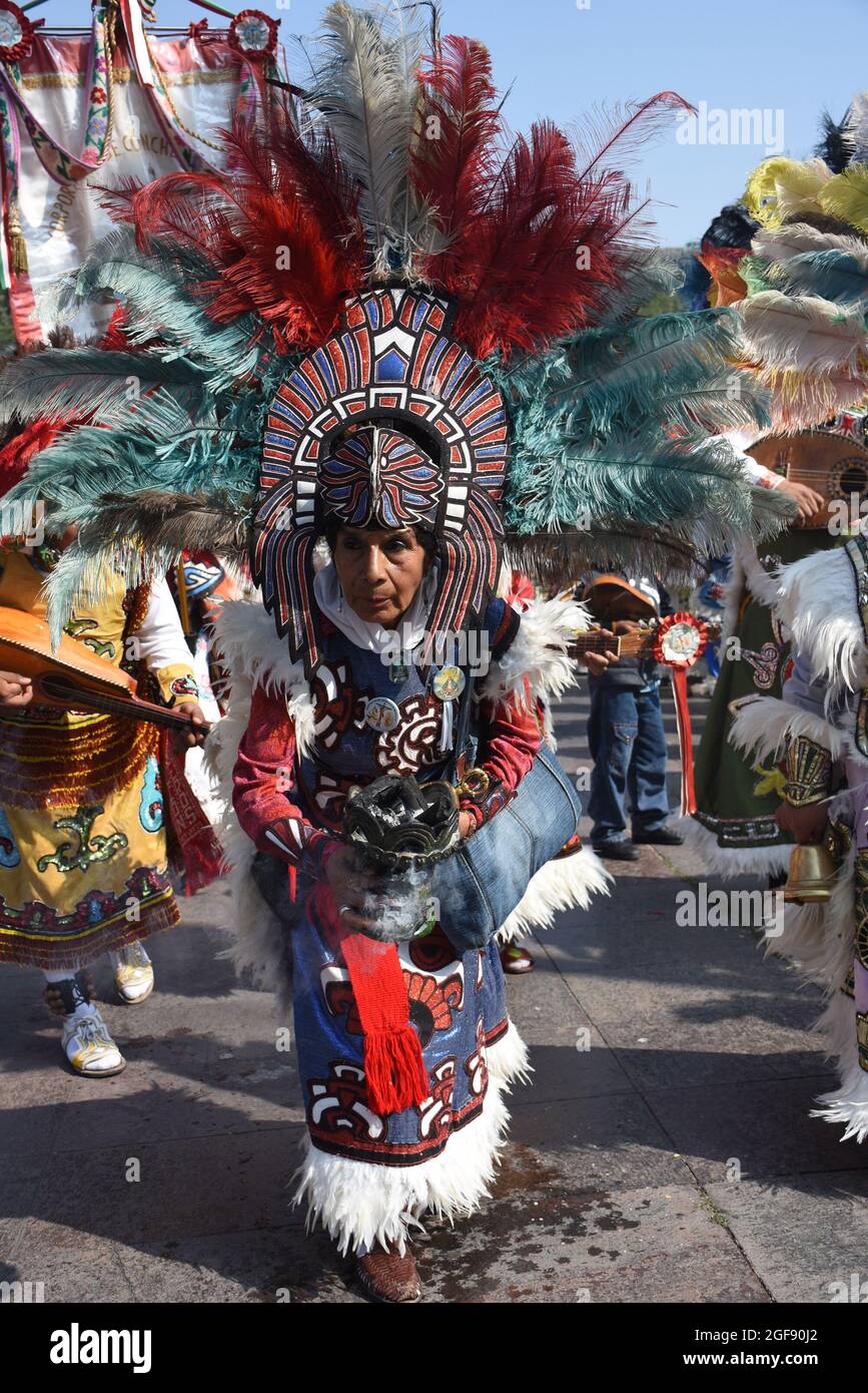 Concheros, traditional dancers and musicians, perform a ritual during ...