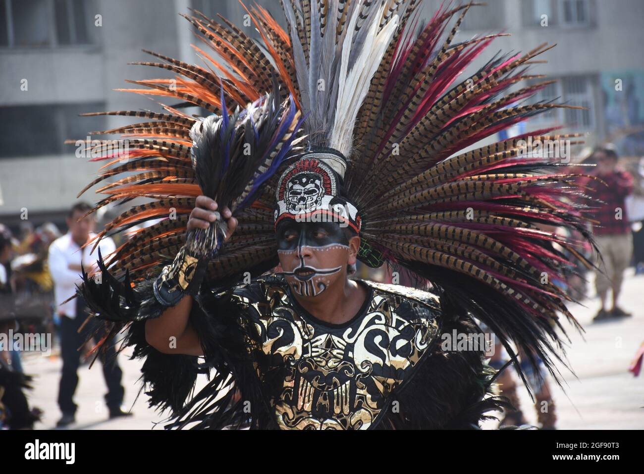 Indigenous people—called Concheros—dressed in traditional clothing for ...