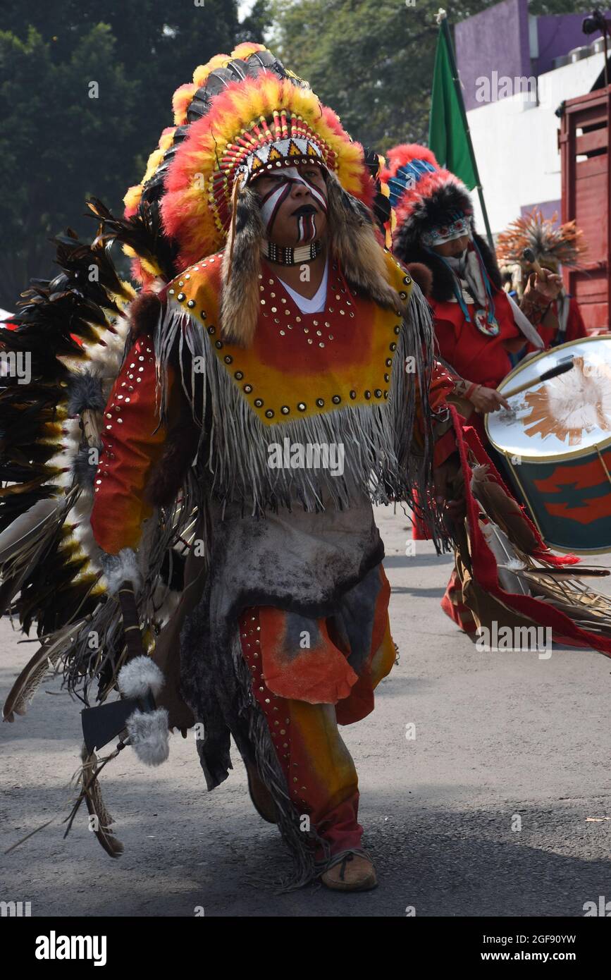 Indigenous people—called Concheros—dressed in traditional clothing for ...