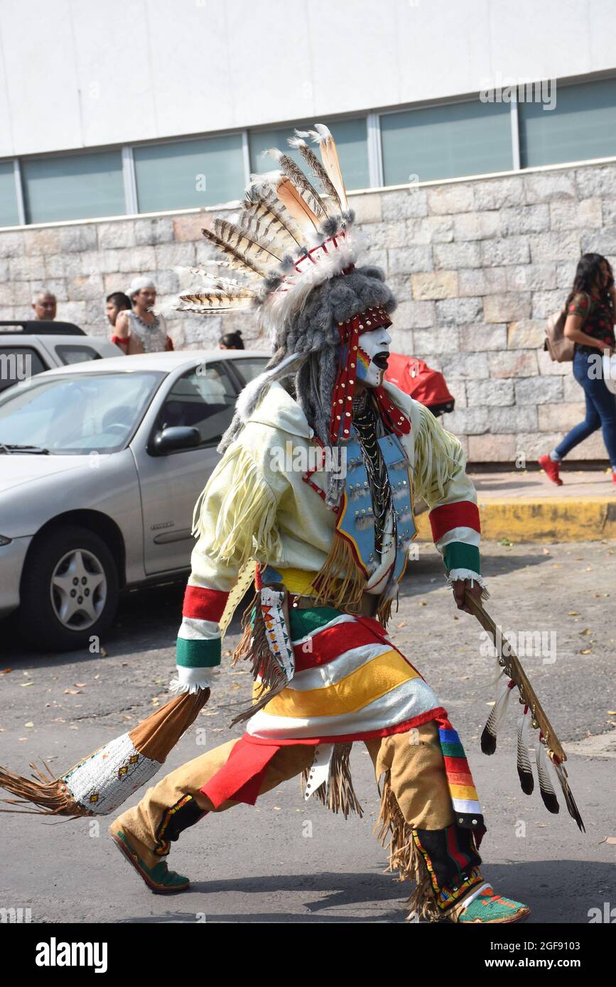 Indigenous people—called Concheros—dressed in traditional clothing for ...