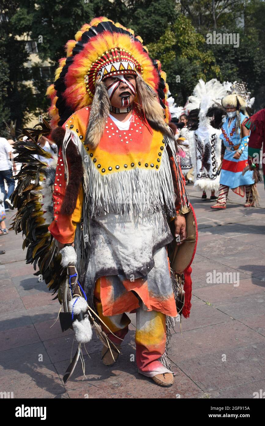 Indigenous people—called Concheros—dressed in traditional clothing for ...