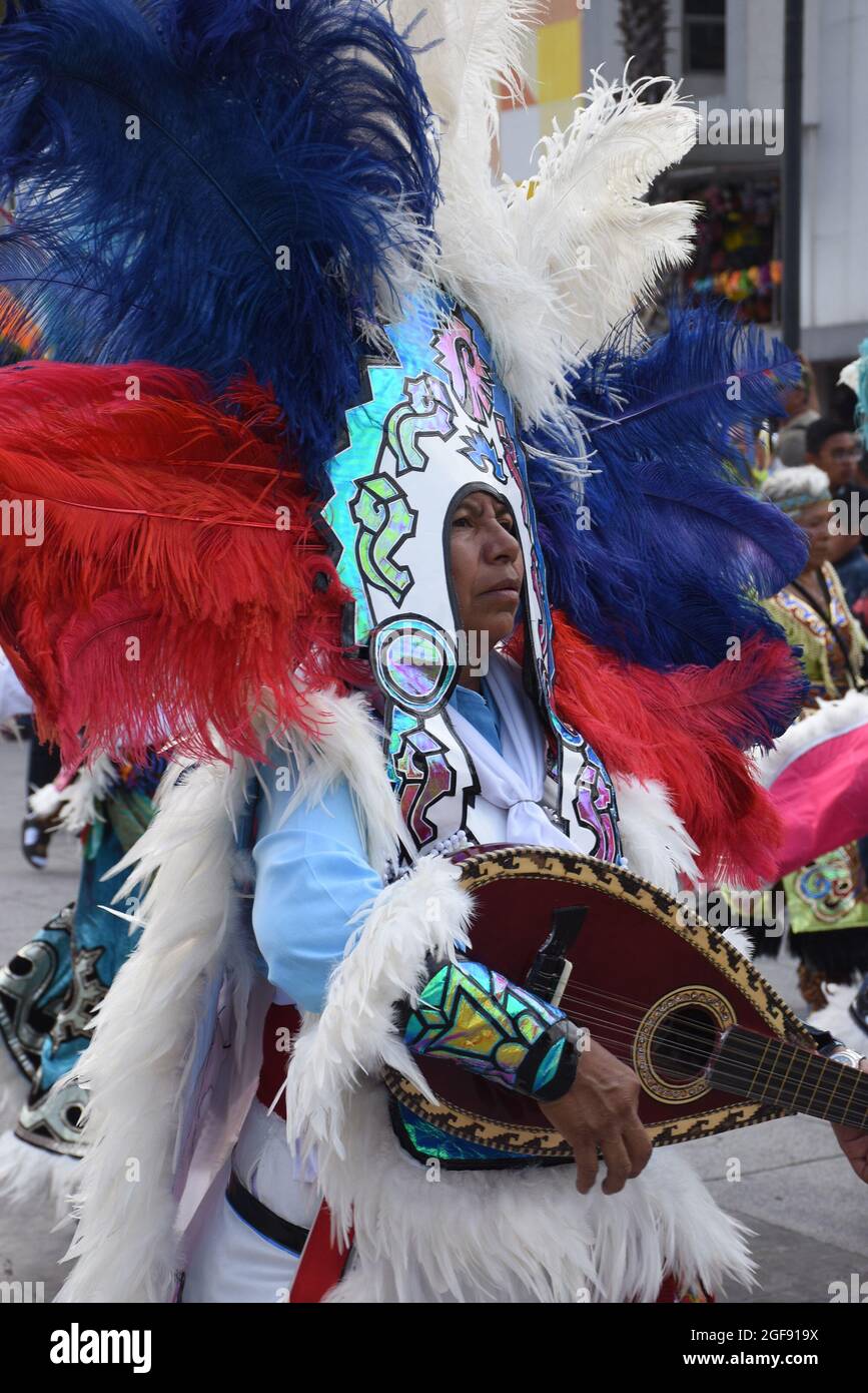 Indigenous people—called Concheros—dressed in traditional clothing for ...