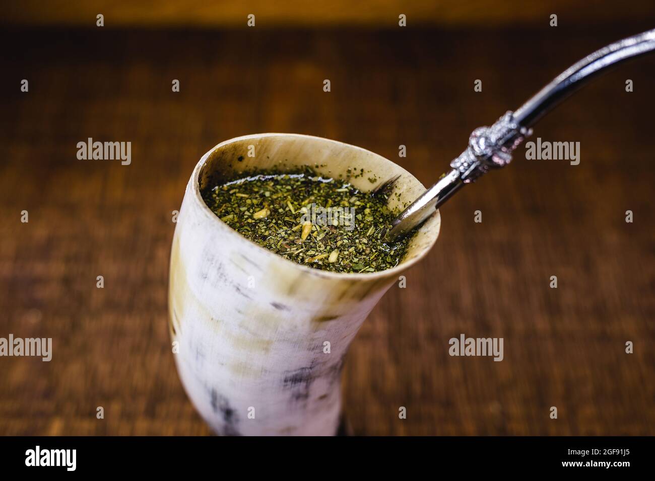 terere, yerba mate drink typical of south america, served in an ...