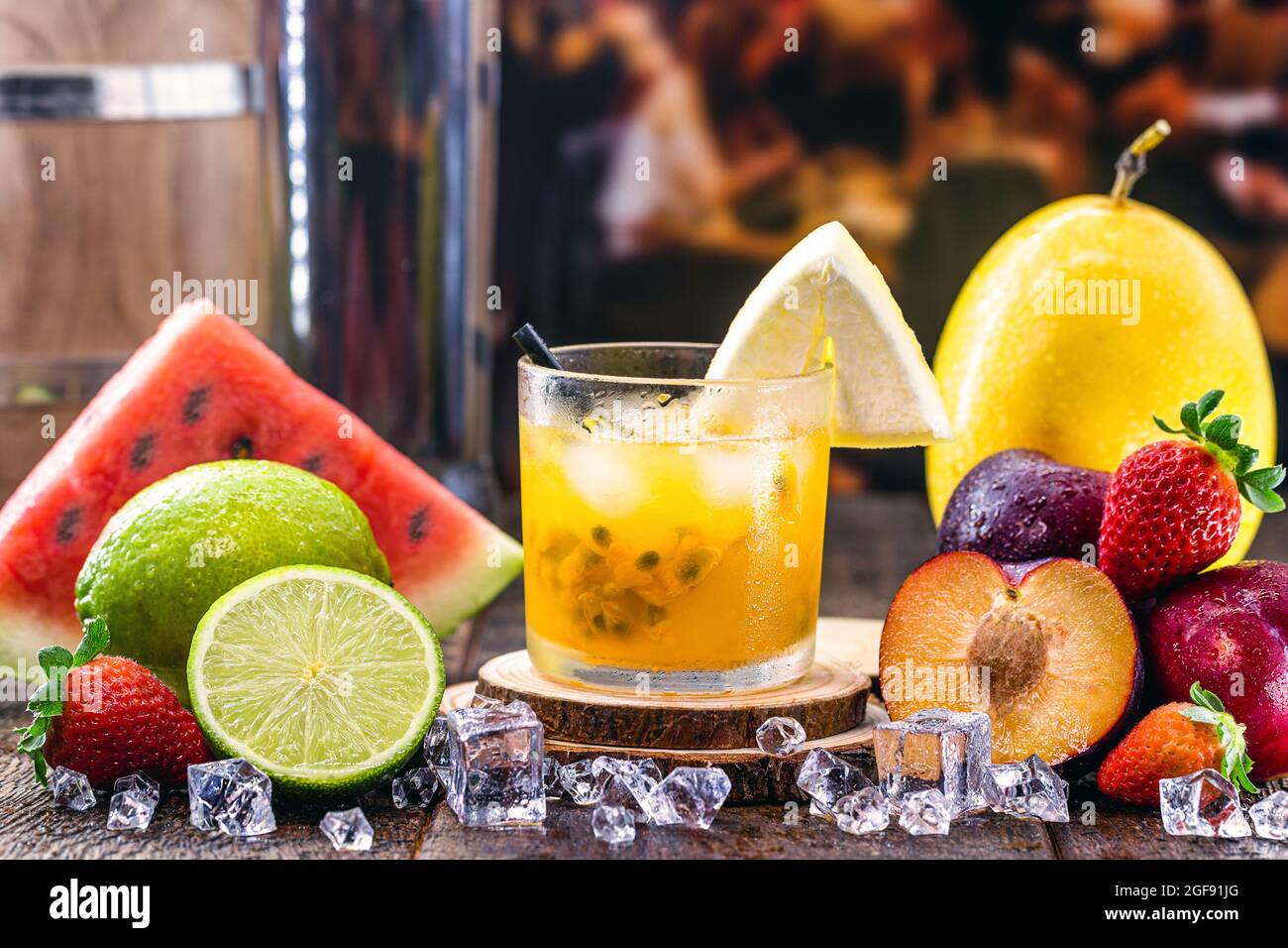 glass of typical Brazilian drink called caipirinha, passion fruit ...