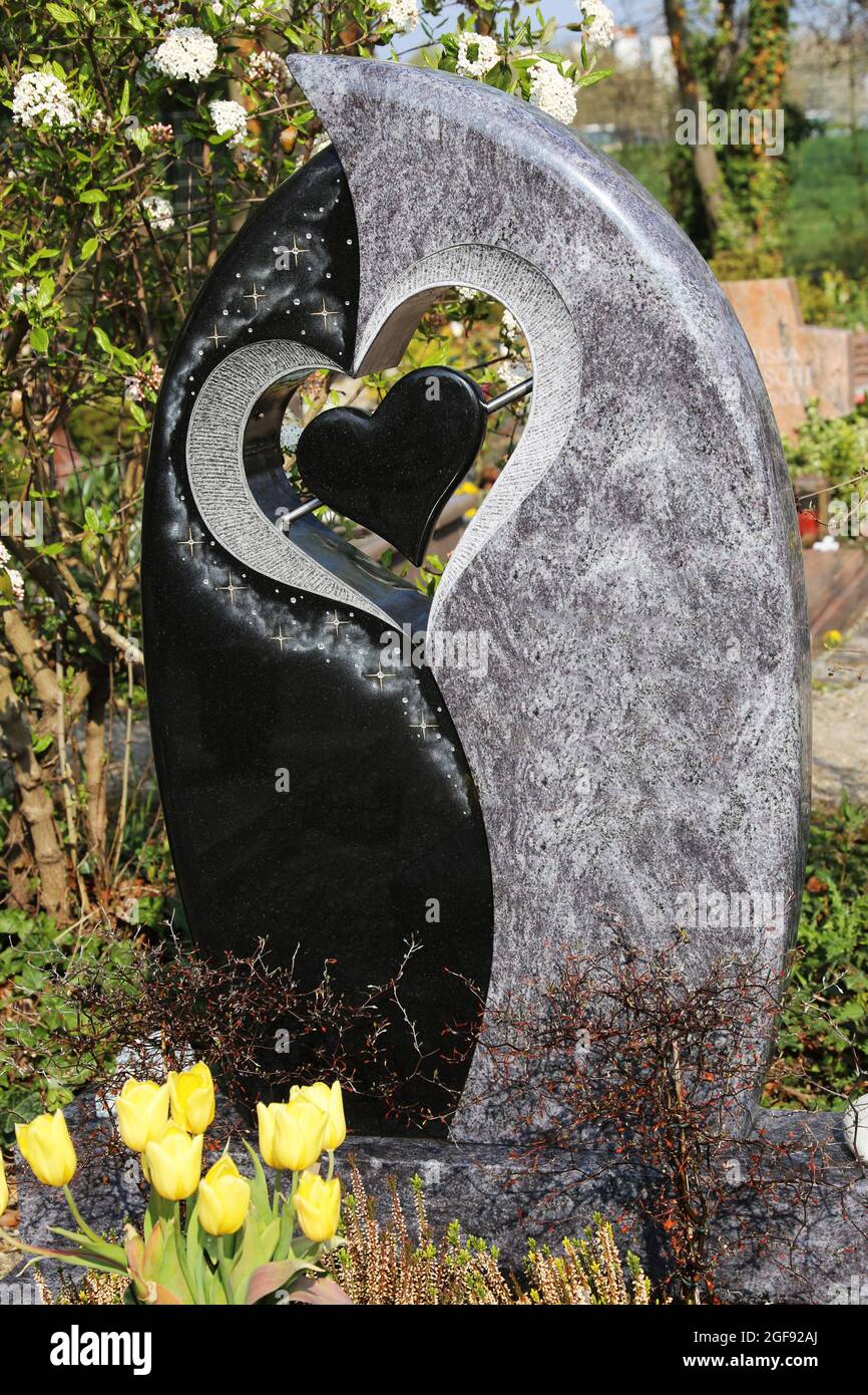 Grave with beautiful gravestone Stock Photo - Alamy